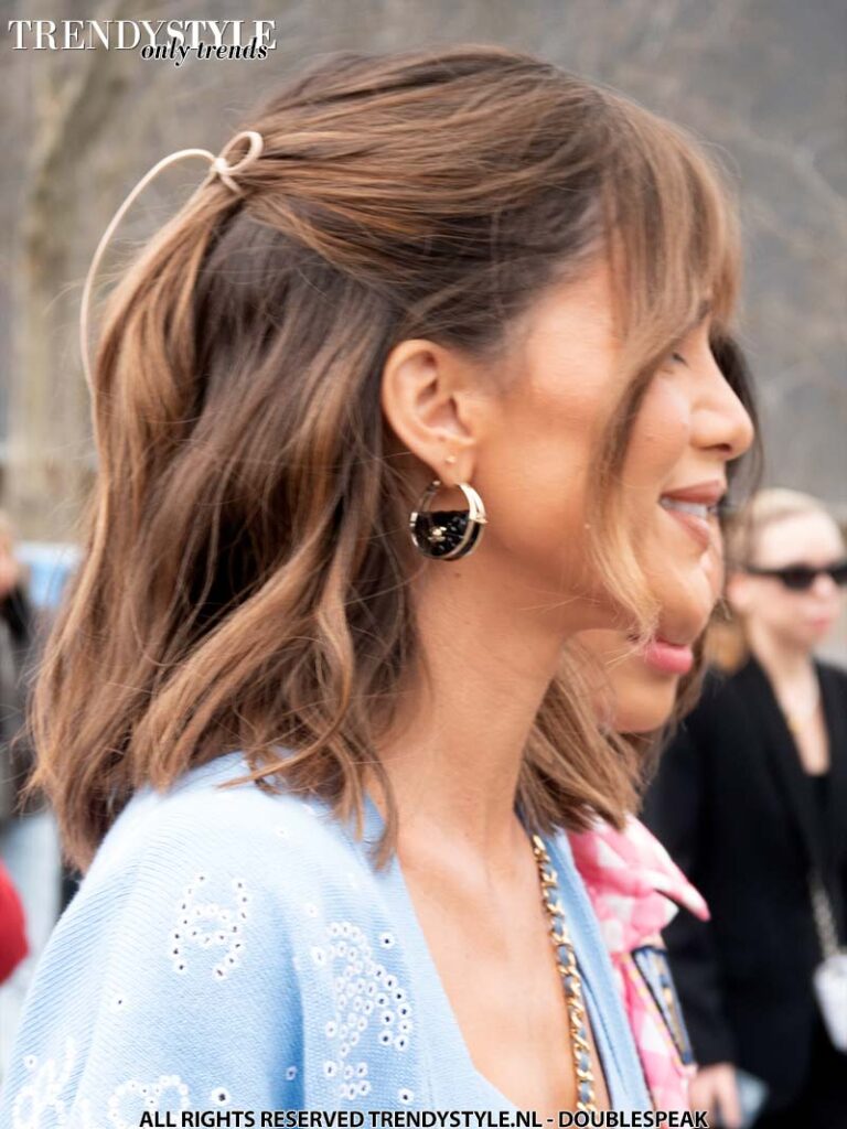 Dit halflange kapsel met pony staat iedereen goed